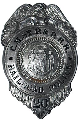 Lot 34: CMSTP&PRR RAILROAD POLICE BADGE