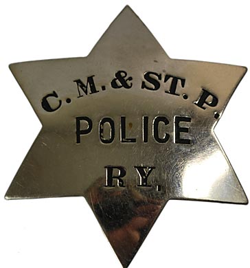 Lot 33: CM&STP RY POLICE BADGE